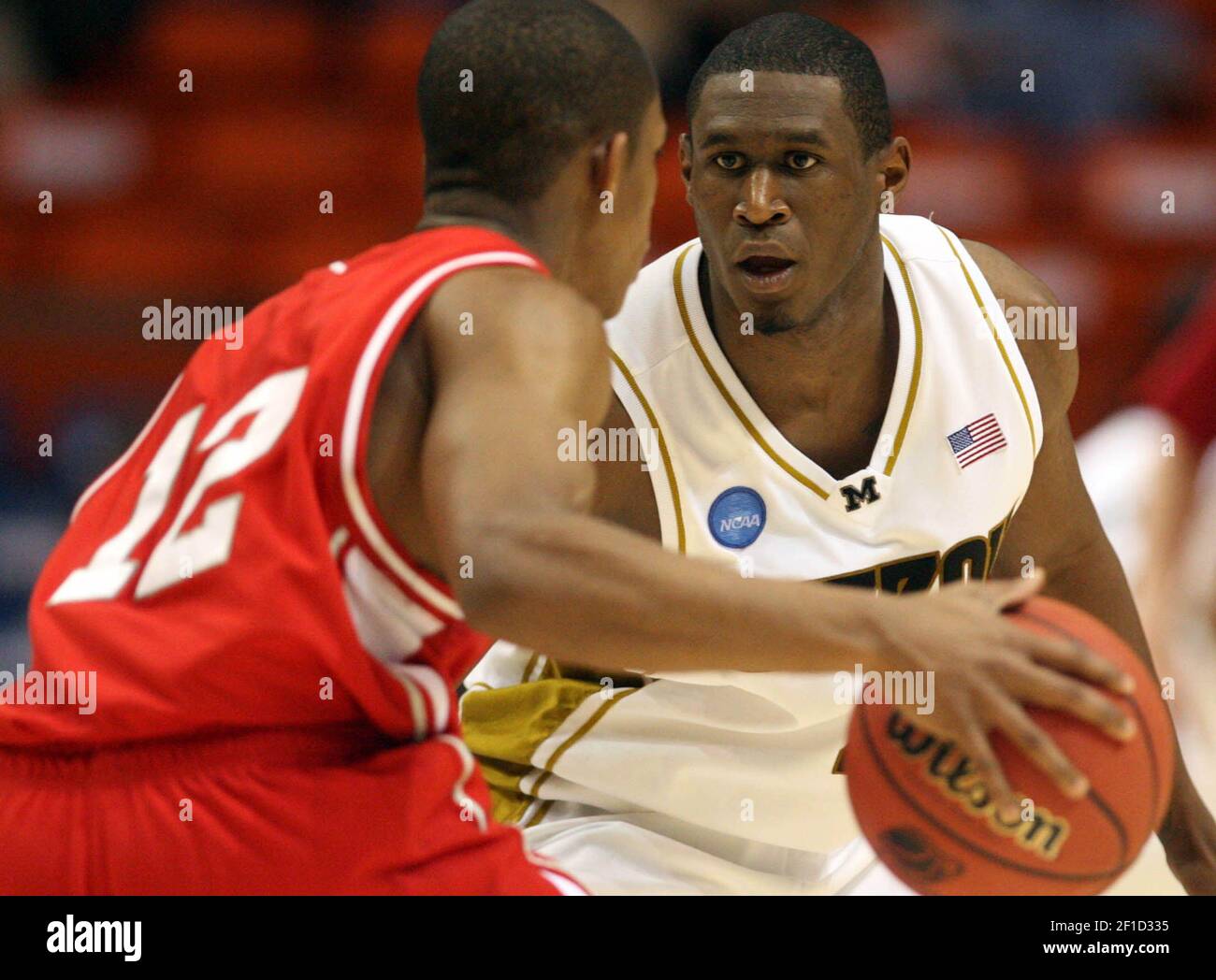 Missouri's J.T. Tiller, right, squares up on Cornell's Louis Dale ...