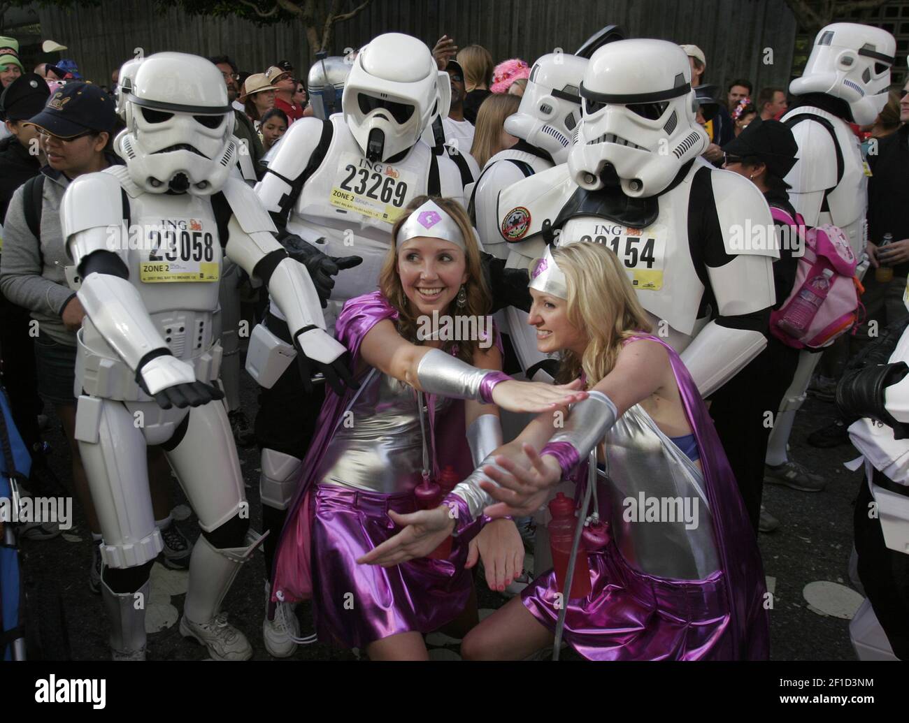 Jenny O'Conell, left, and Melissa Beatty pose for a photo with members ...