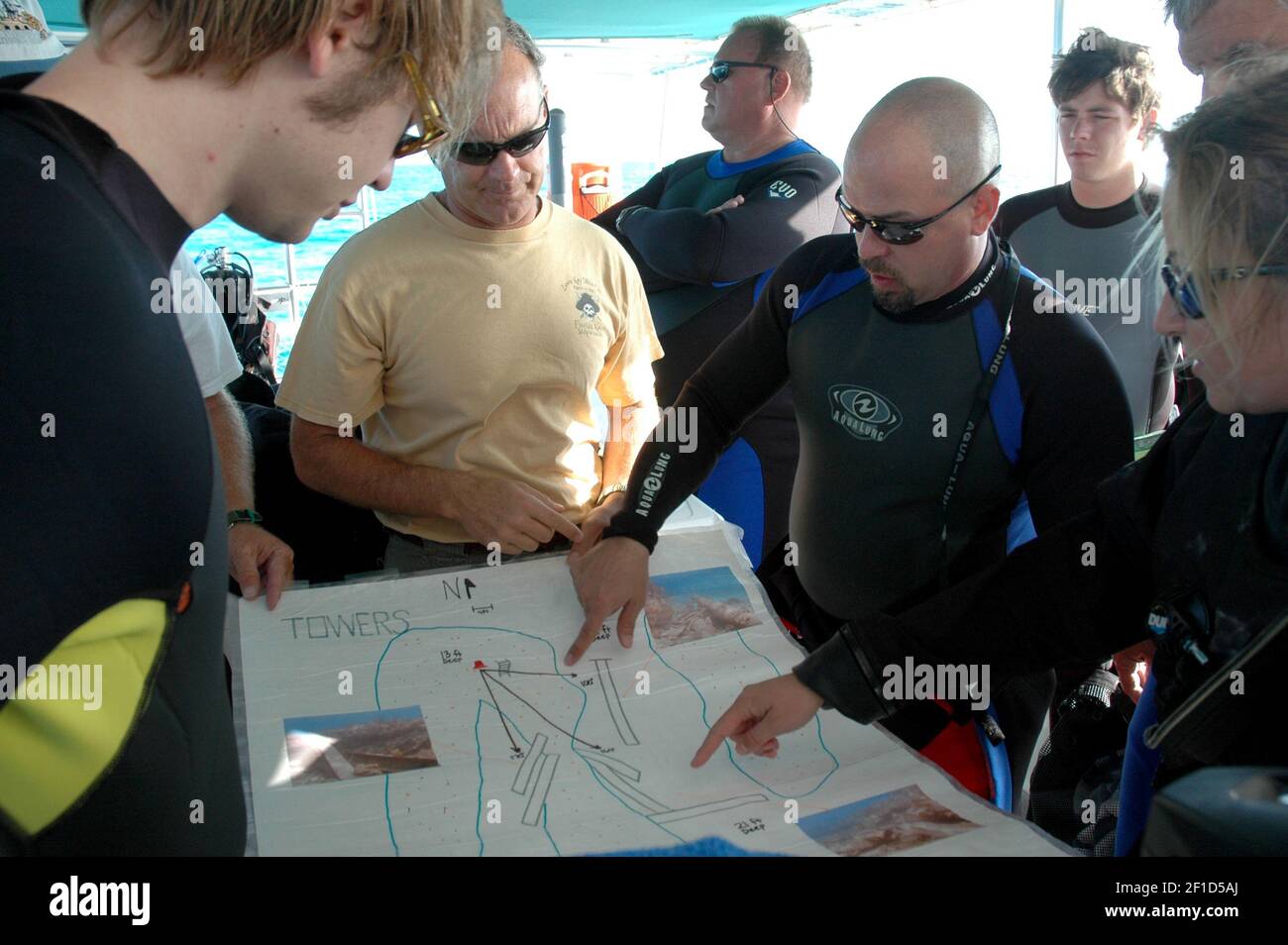 Dr. Patrick Rice points to an area of Looe Key reef in Florida where ...