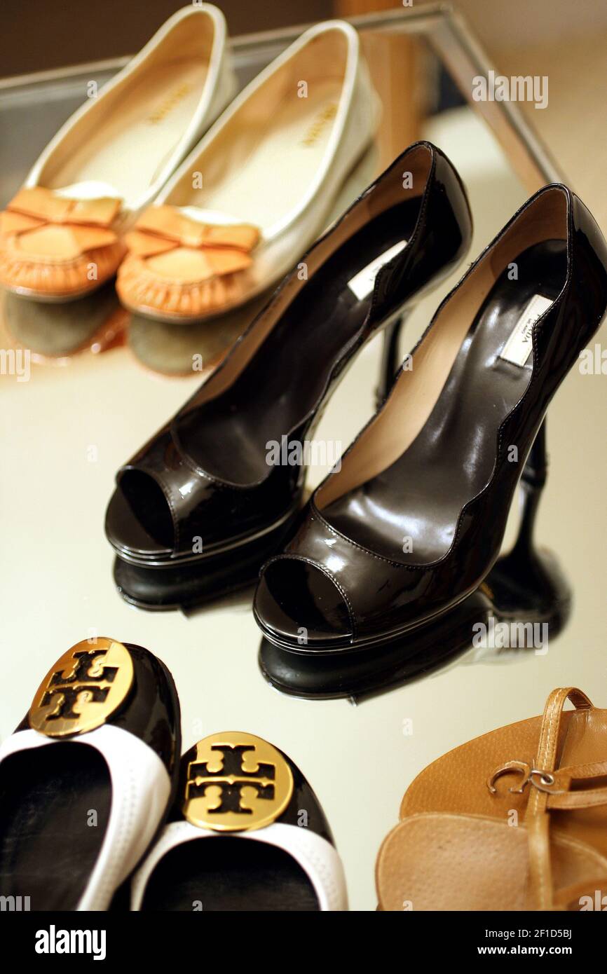 Nancy Gansky's collection of shoes includes Peek-a-boo Pradas and Tori ...