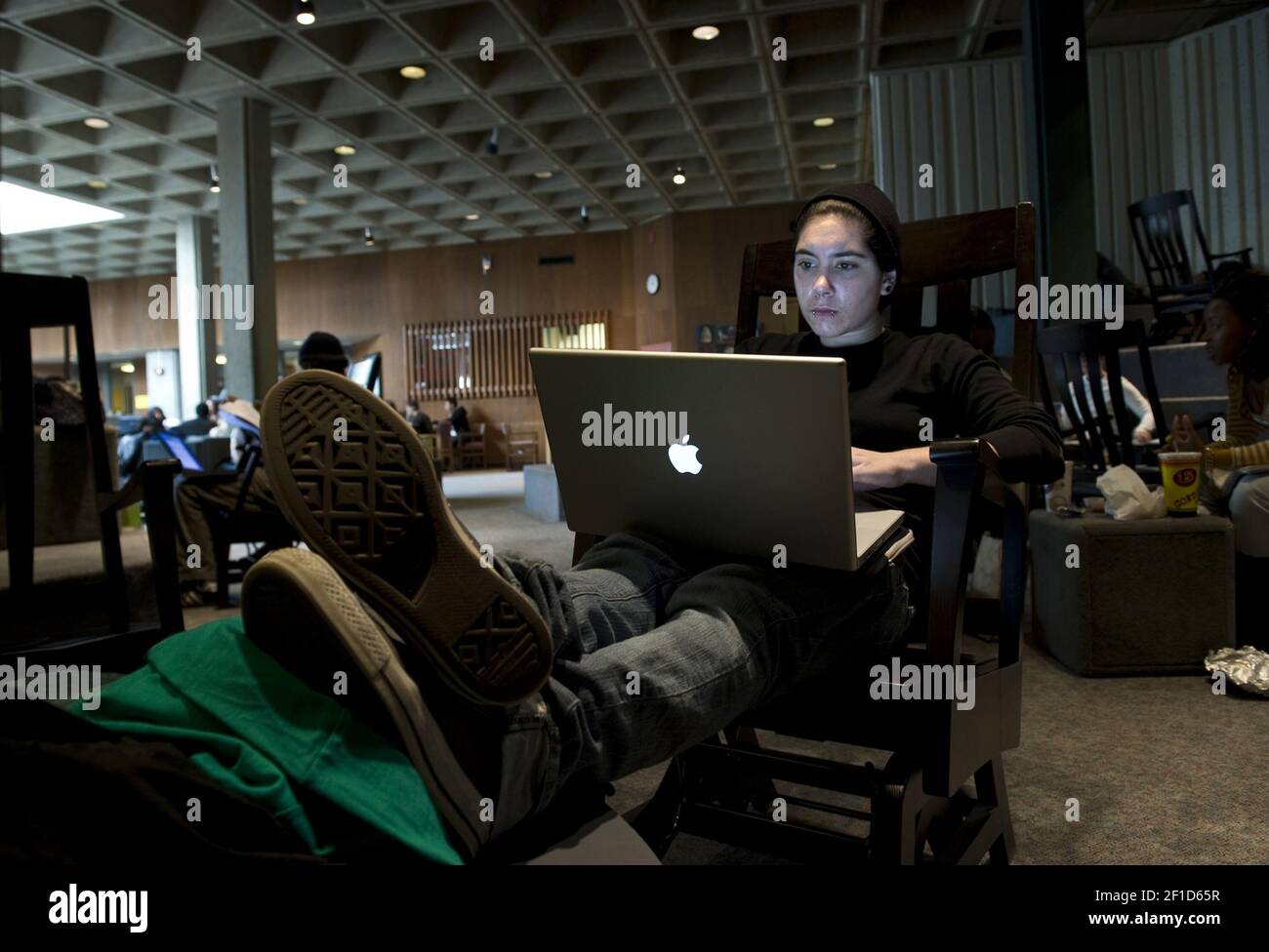 Sarah Gusman, a student at Sacramento State University, works on her ...