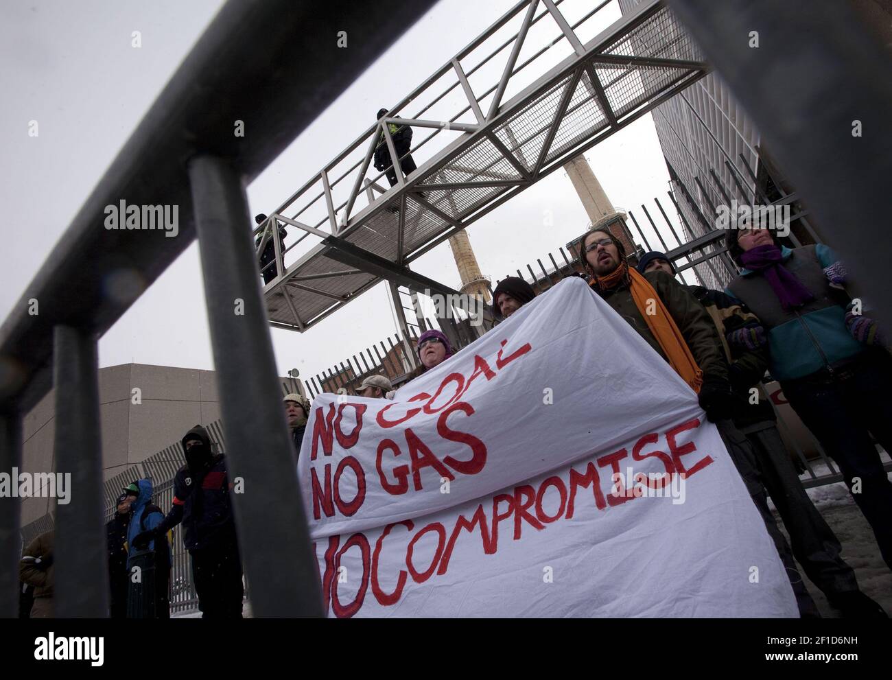 Demonstrators march for clean energy protesting at a rally on Capitol ...