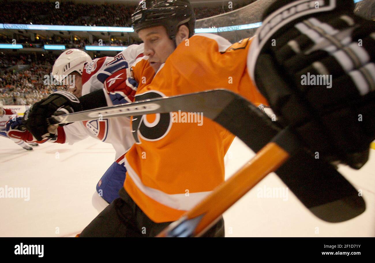 Philadelphia Flyers' Mike Knuble gets hooked by Montreal Canadiens ...