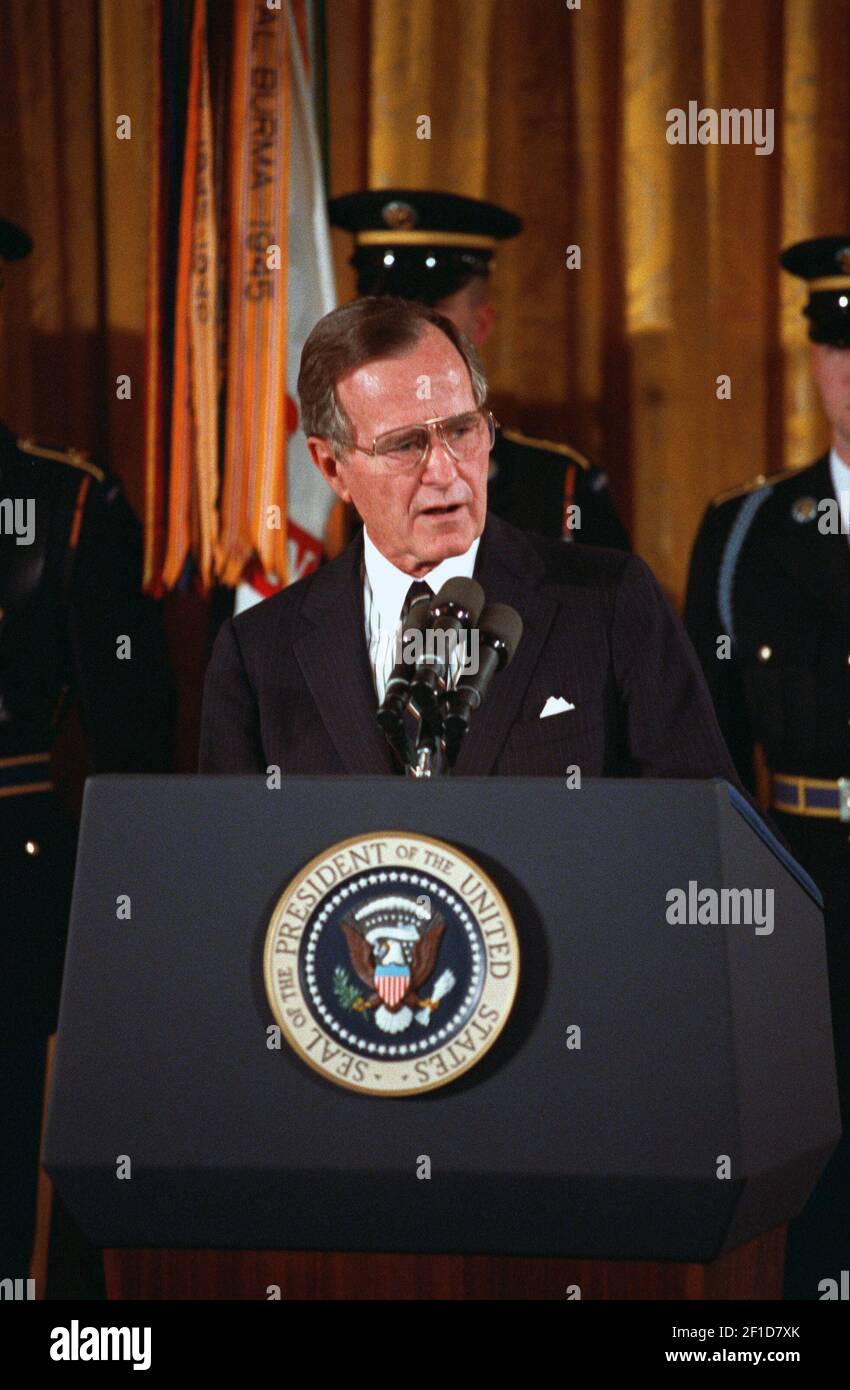 President George H. W. Bush presents a posthumous Medal of Honor to the ...