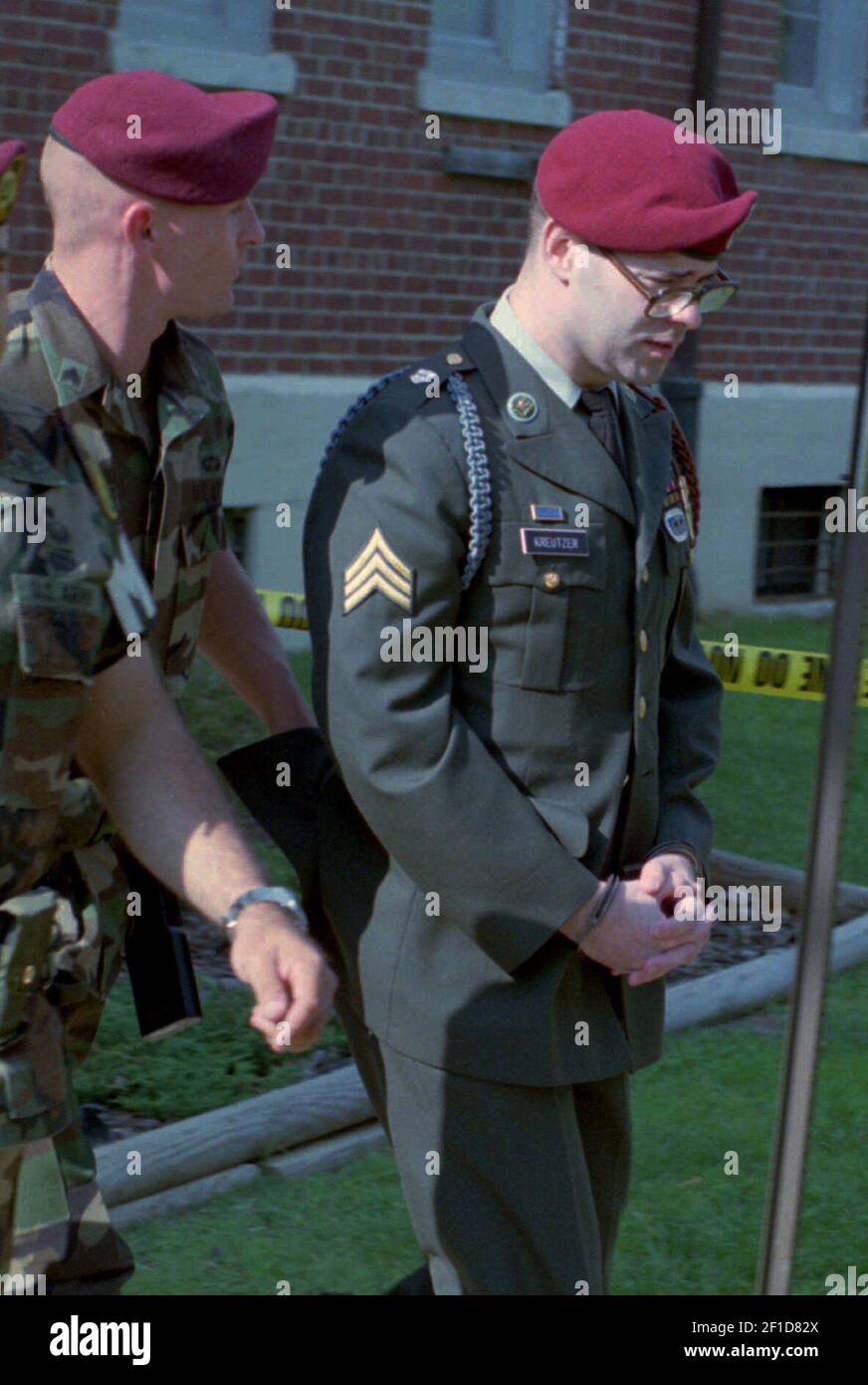 Former Army Sgt. William Kreutzer leaves his courtmartial hearing after ...