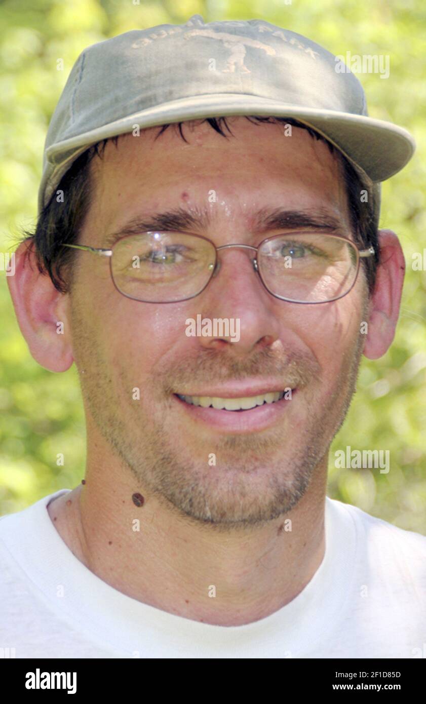 Brian Borkholder of Hermantown, Minnesota, fishes a small lake in ...