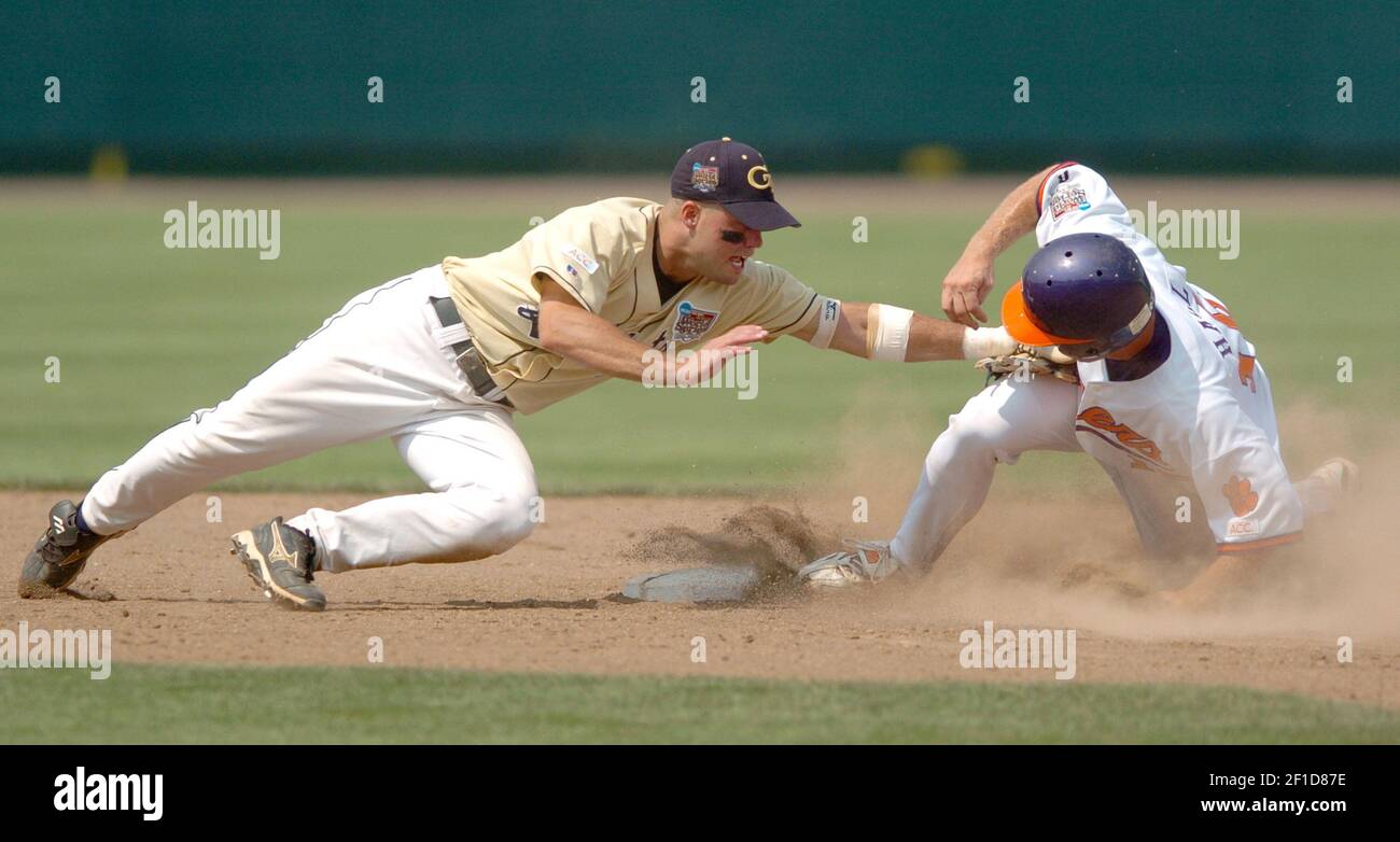 Georgia Tech's Mike Trapani (1) gets to Clemson's pinch hitter Ben Hall ...