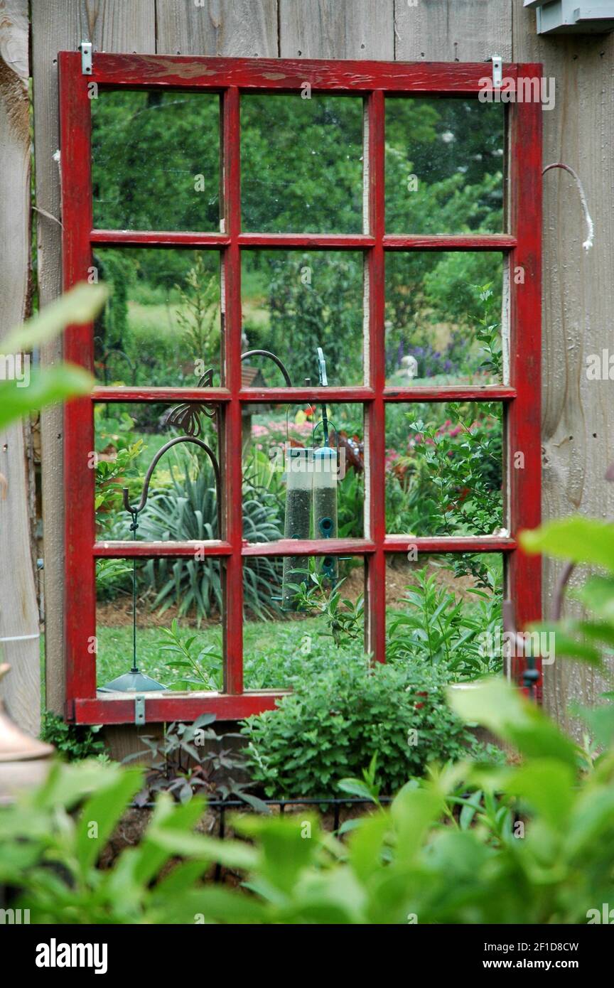 Mirrored window can transform the look of a garden. (Photo by Norm ...