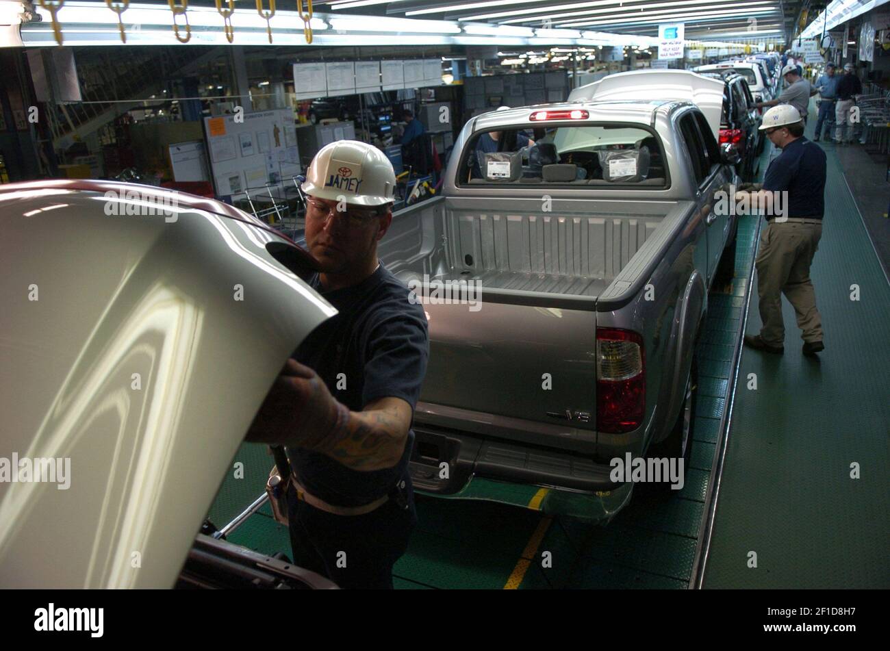 Workers check for defects at the Toyota plant in Princeton, Indiana ...