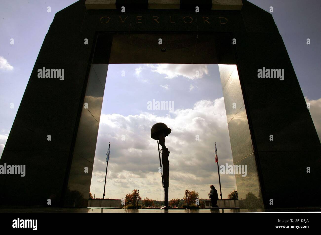 A large granite arch dominates the entrance to The National D-Day ...