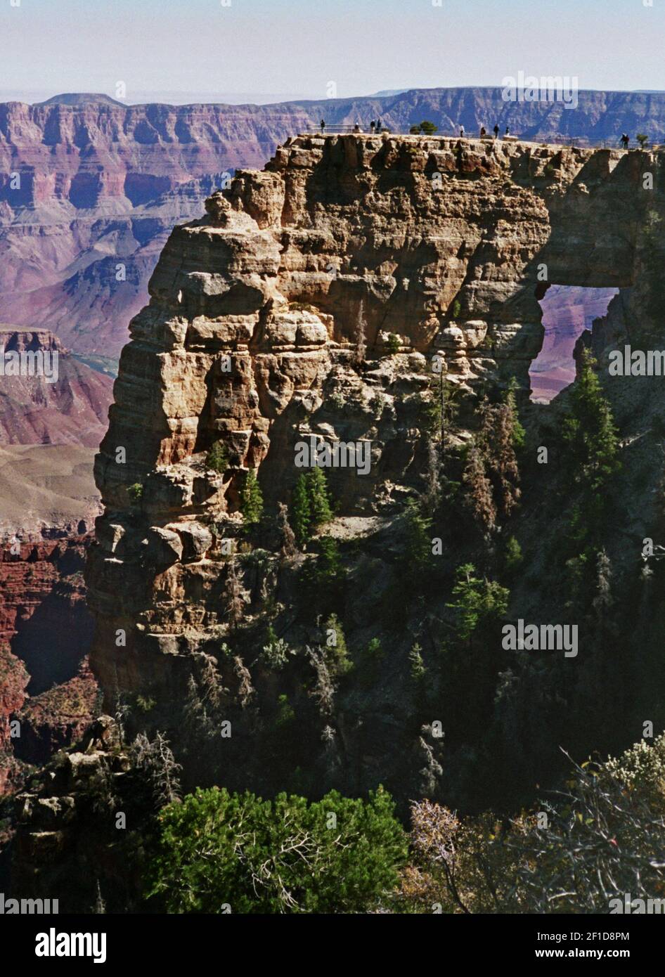 Visitors take in the view from atop Grand Canyon Arch near Cape Royal ...