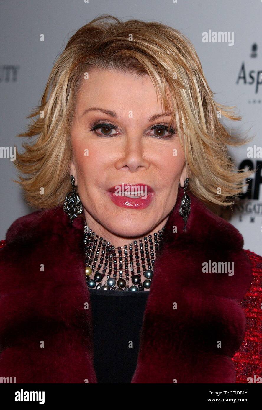 Joan Rivers poses as she arrives at the "Stage Beauty" premiere, held ...