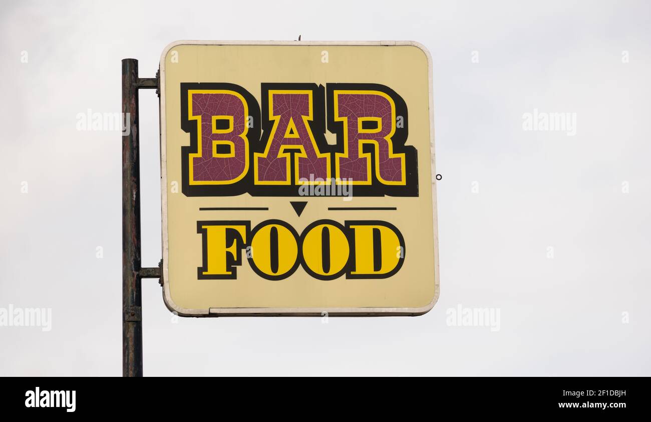 Rusted Metal Faded Sign Advertising Bar Food Stock Photo - Alamy