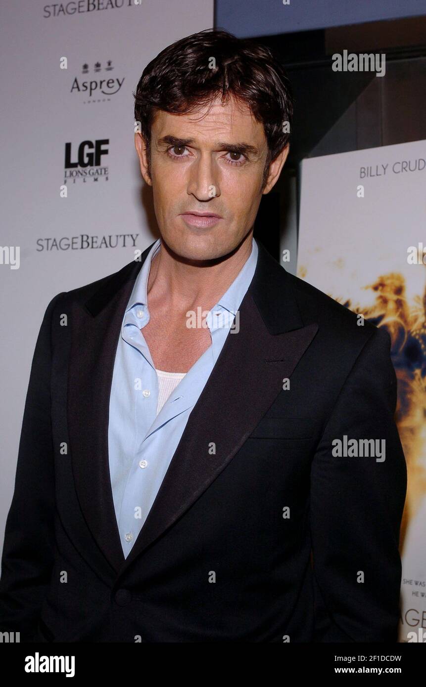 Rupert Everett poses as he arrives at the "Stage Beauty" premiere, held ...