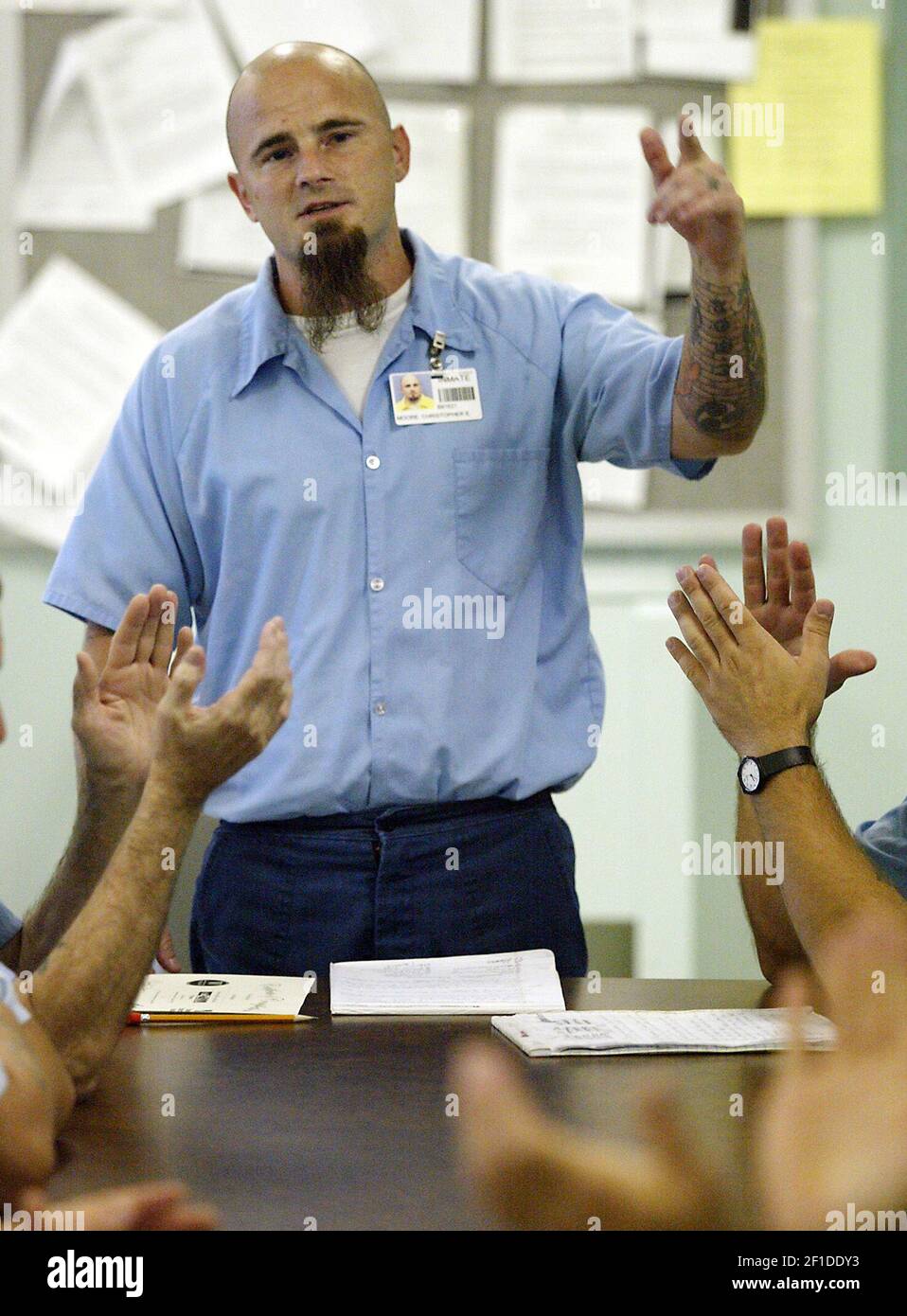 Inmate Christopher Moore addresses the other inmates in a graduation ...