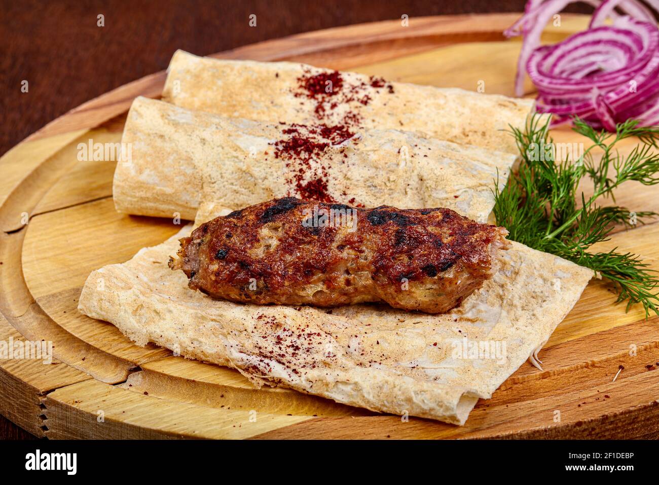 Pork kebab grilled minced meat served onion Stock Photo - Alamy