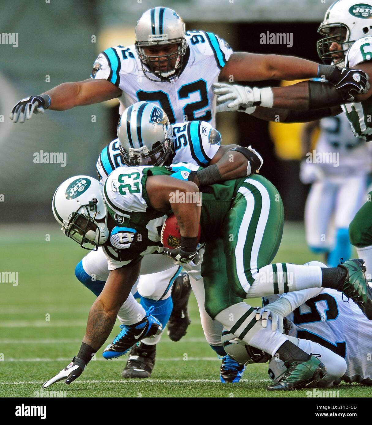 Carolina Panthers defensive tackle Damione Lewis (92), linebacker Jon ...
