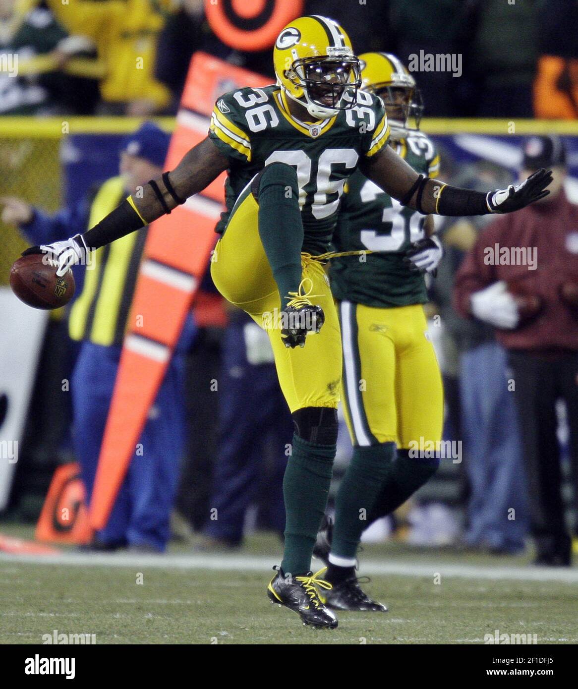 Green Bay Packers safety Nick Collins reacts after intercepting a pass ...