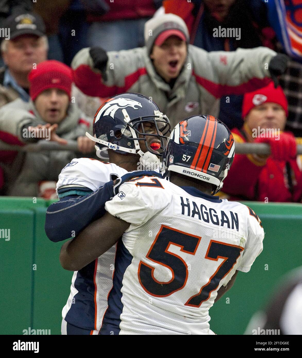Denver Broncos cornerback Andre' Goodman (21) is congratulated by ...