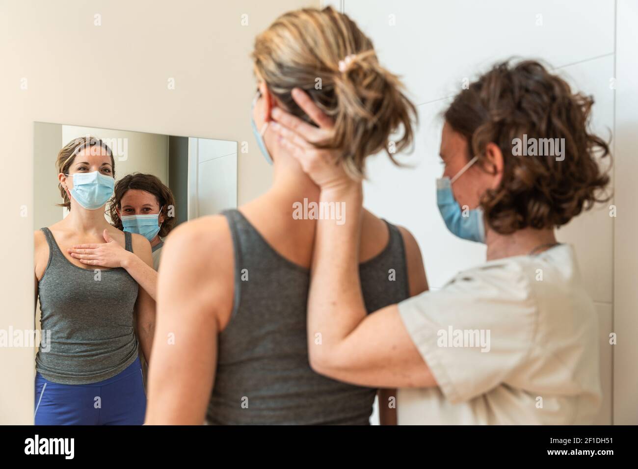 Physiotherapist and patient in Global Postural correction session, with ...