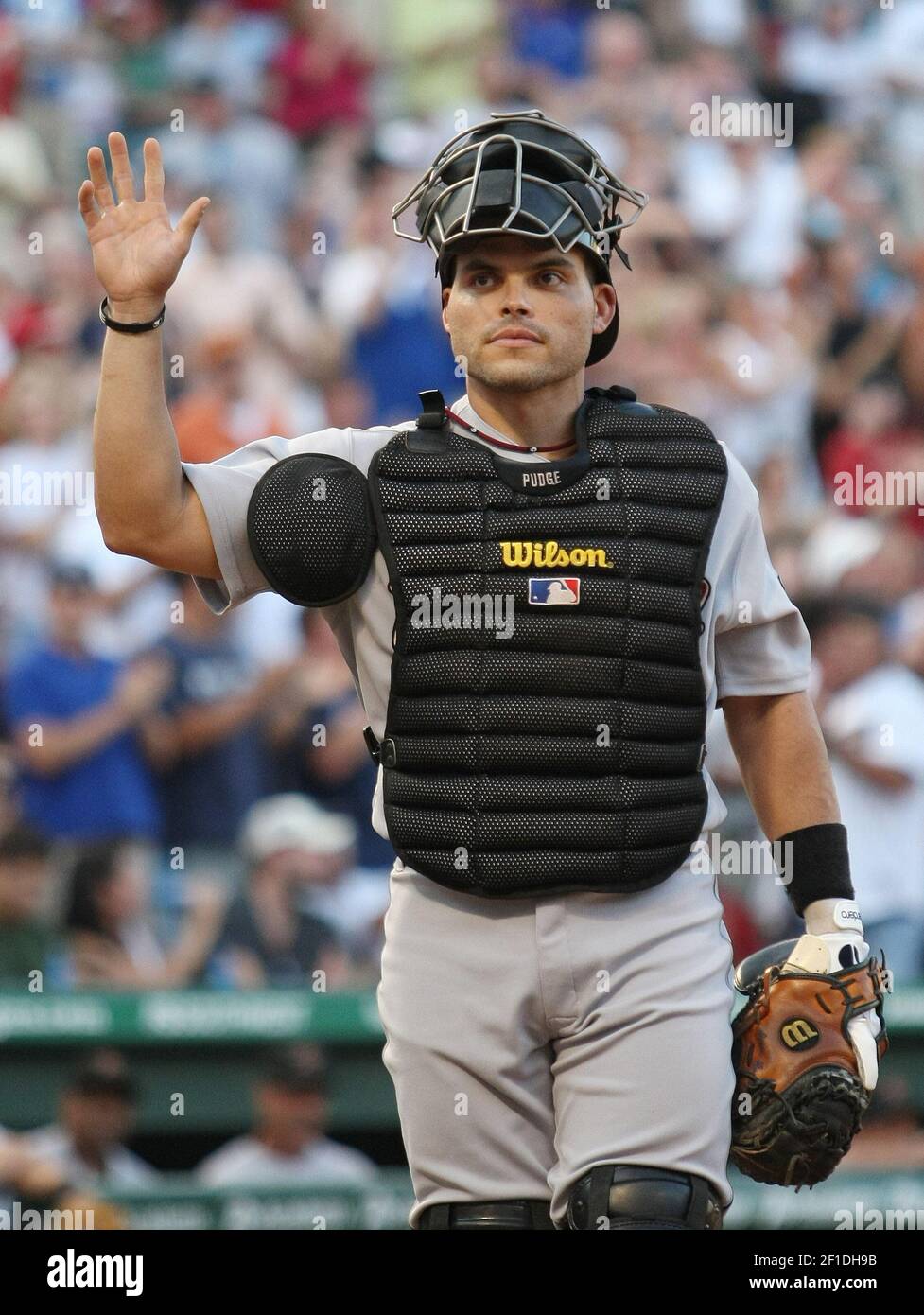 Houston Astros catcher Ivan "Pudge" Rodriguez acknowledges a standing ...