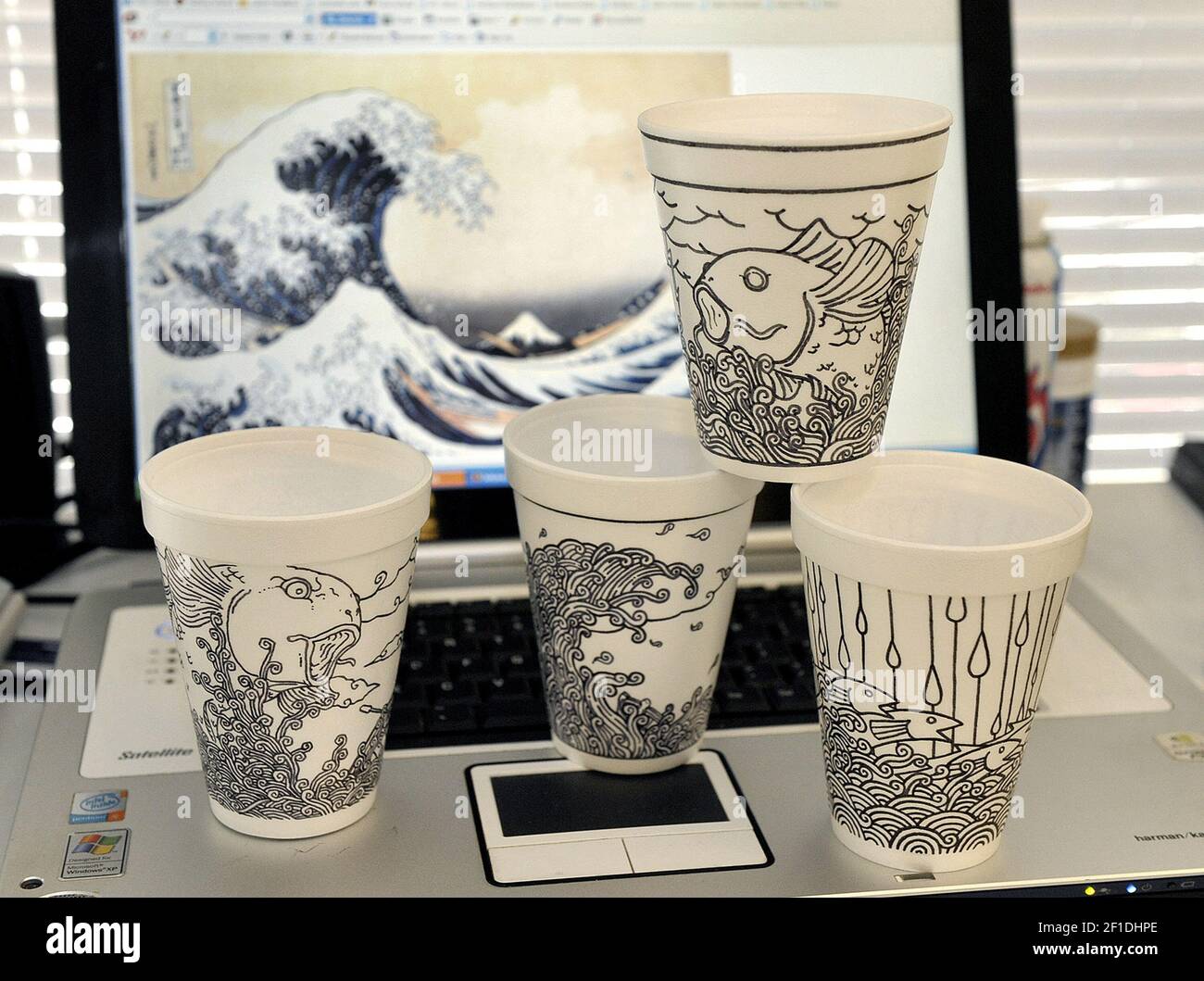 Waves and water are a frequent theme in the styrofoam cup and napkin ...