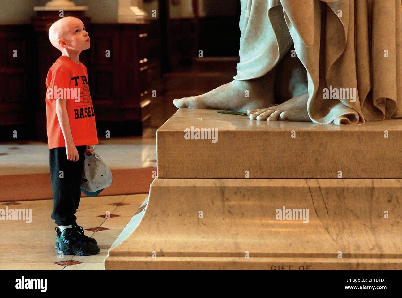 In this May 7, 1996 file photograph, Grayson Gilbert, 6, of Towson left ...
