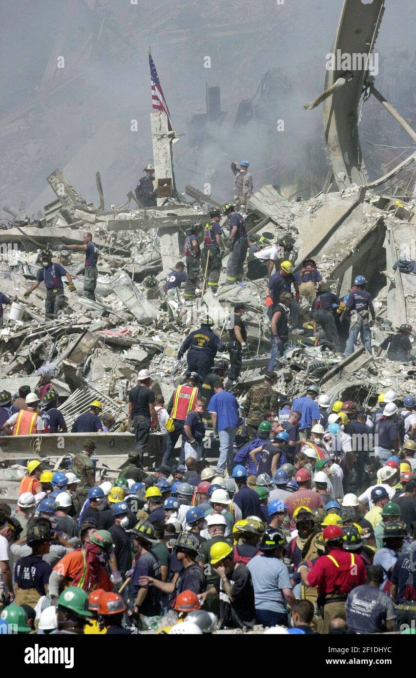 Thousands of workers search the remains of the World Trade Center ...