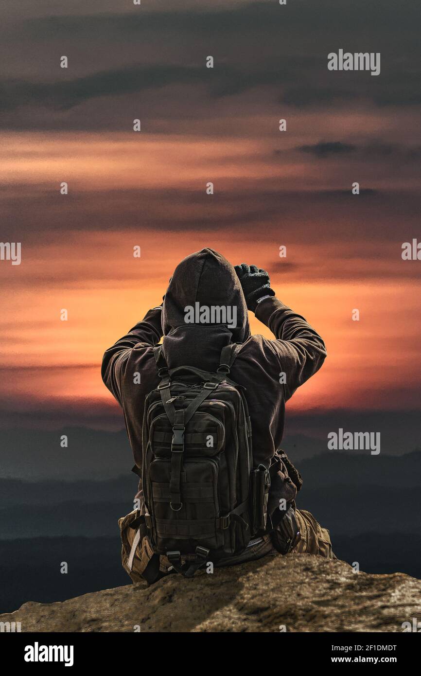 Back View Man Taking Photos of Sunset Stock Photo - Alamy