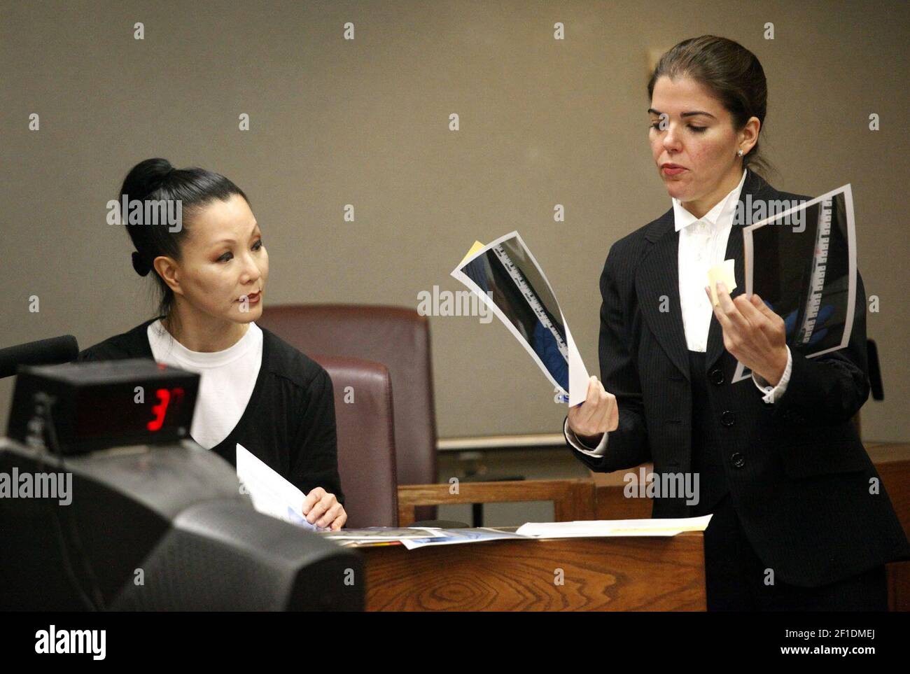 Miami-Dade Medical Examiner Dr. Emma Lew, left, in a file image. (Photo ...