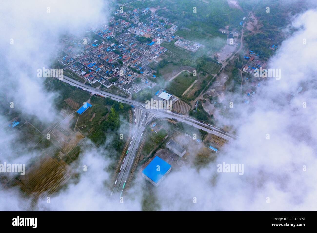 An aerial view of a complicated interchange linking different ...