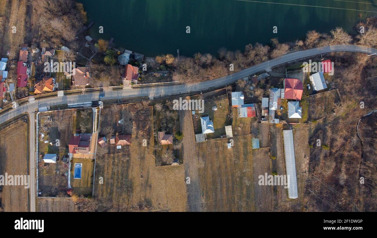 An aerial view of a small village near a river Stock Photo - Alamy