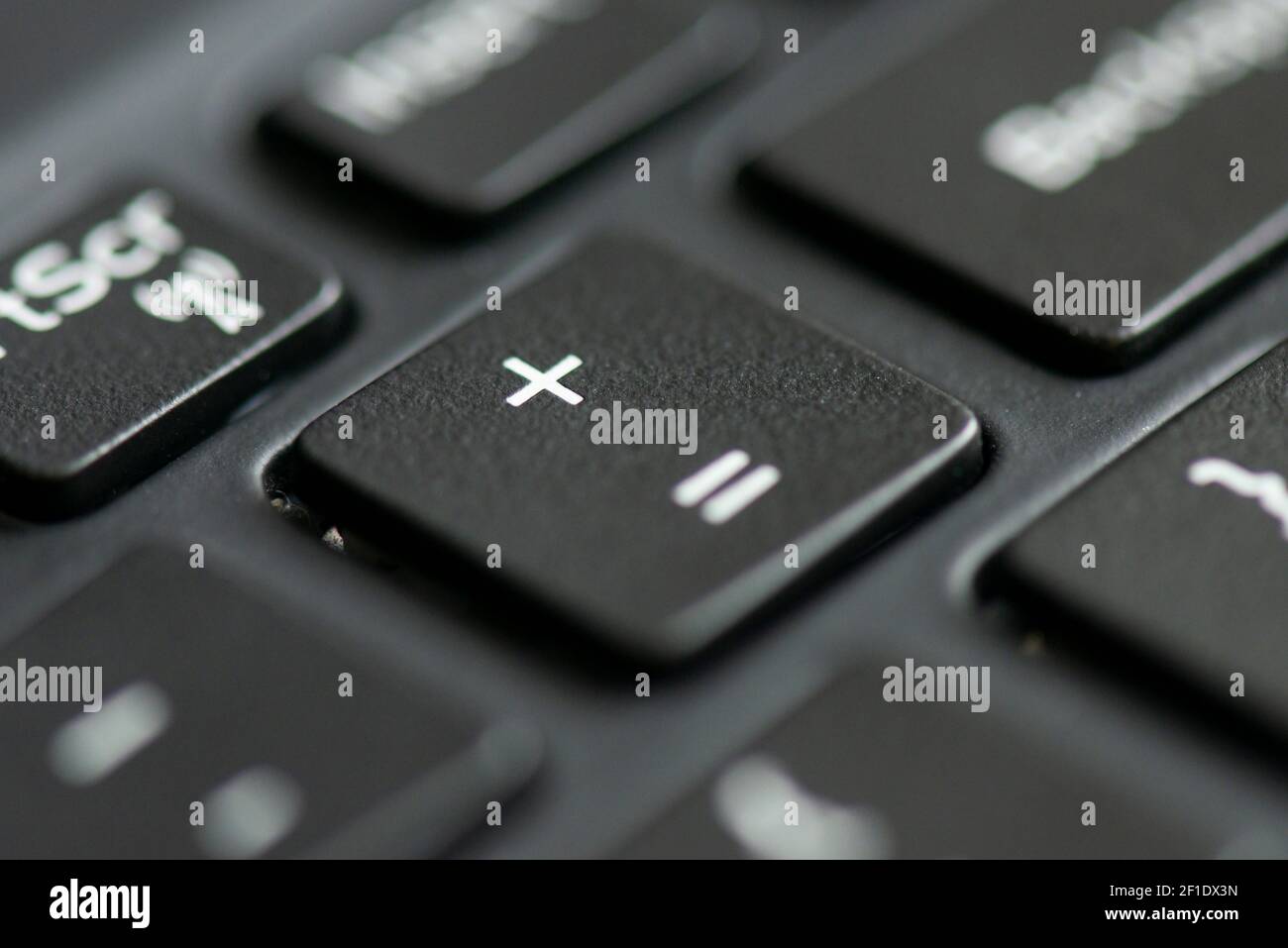 Equals and plus key on a laptop keyboard Stock Photo - Alamy