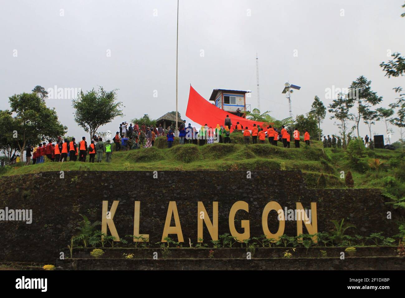 Indonesian Army (TNI) and residents during a flag ceremony ahead of the ...