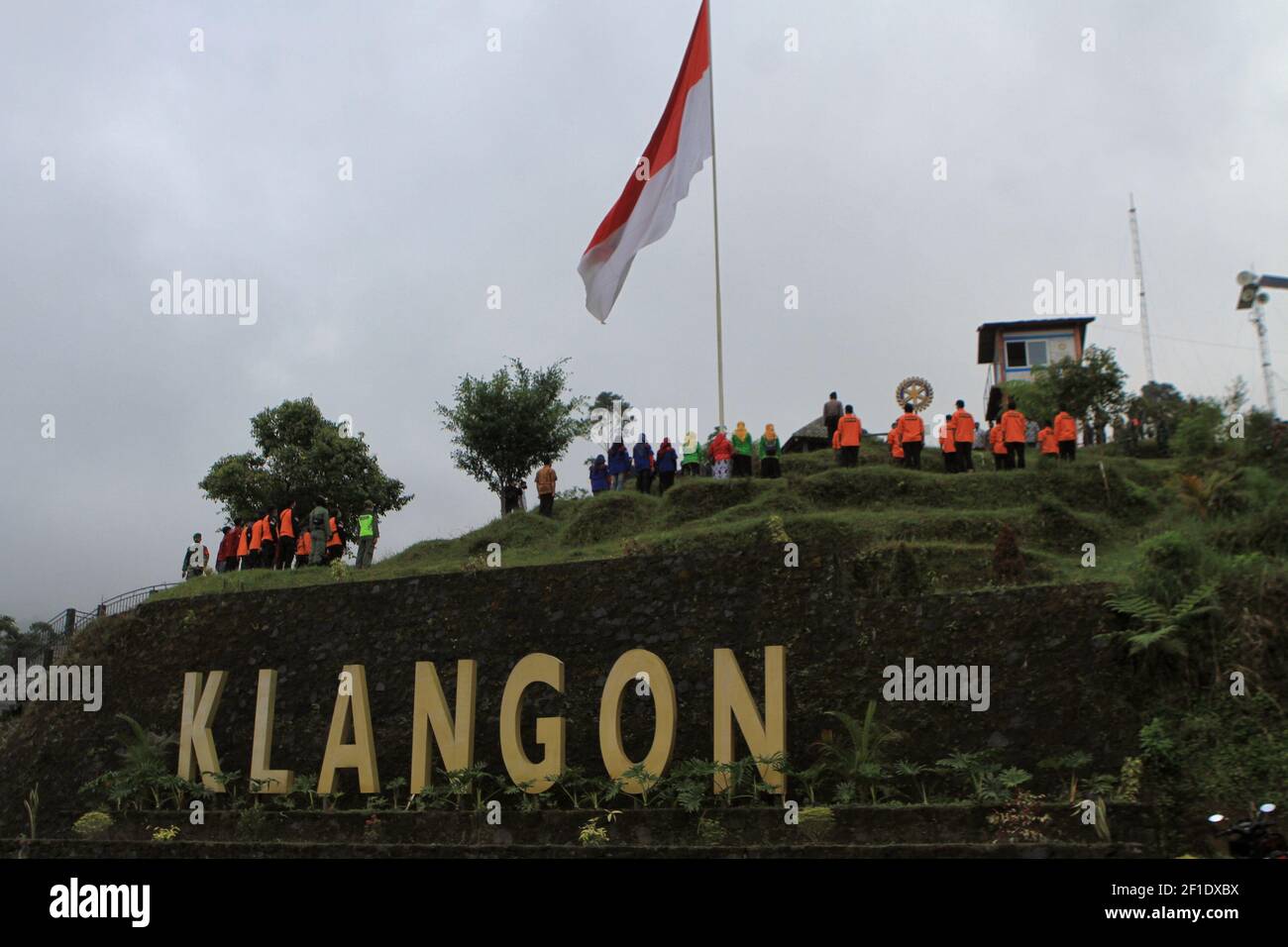 Indonesian Army (TNI) and residents during a flag ceremony ahead of the ...
