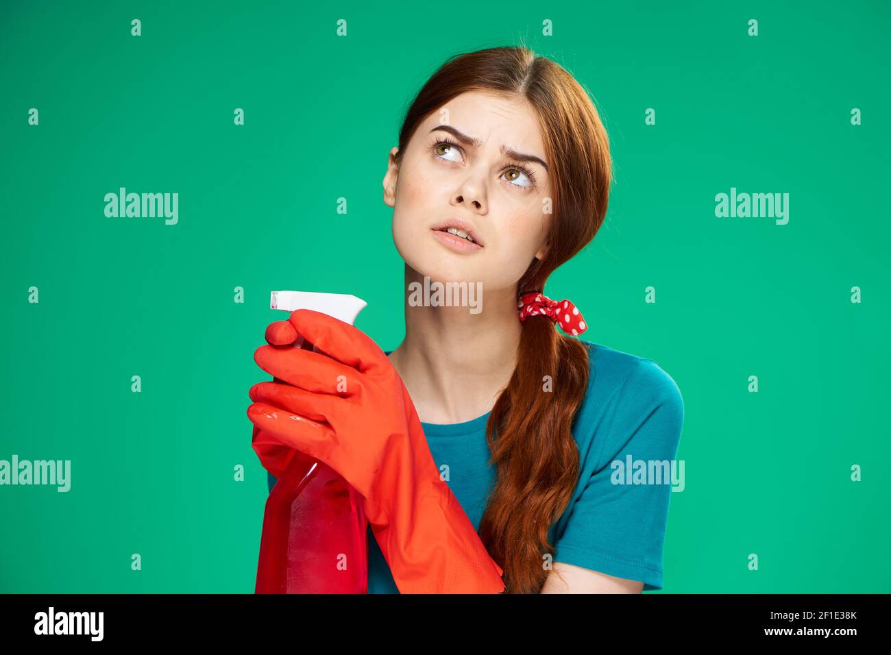 emotional woman detergent service housework green background Stock ...