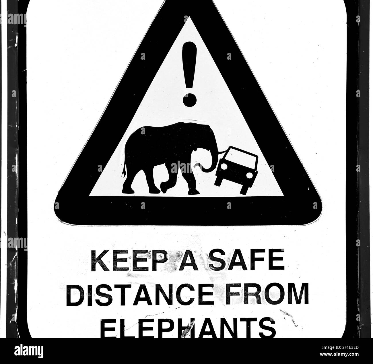 Elephant warning sign Black and White Stock Photos & Images - Alamy