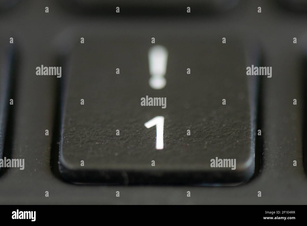 Number 1 and exclamation key on a laptop keyboard Stock Photo - Alamy