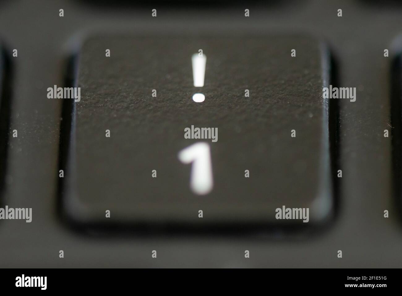 Number 1 and exclamation key on a laptop keyboard Stock Photo - Alamy