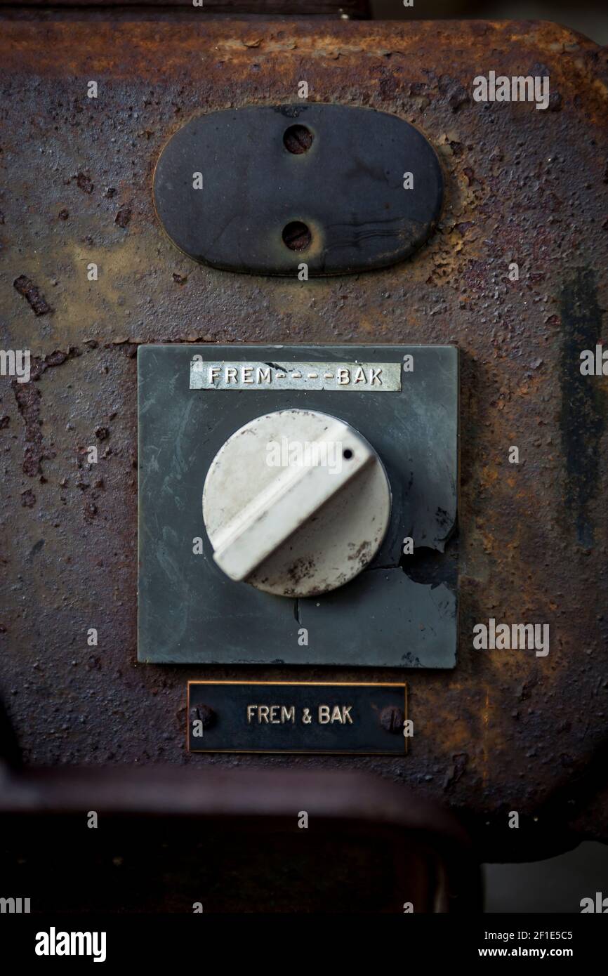 A old vintage rustic button on a machine Stock Photo - Alamy