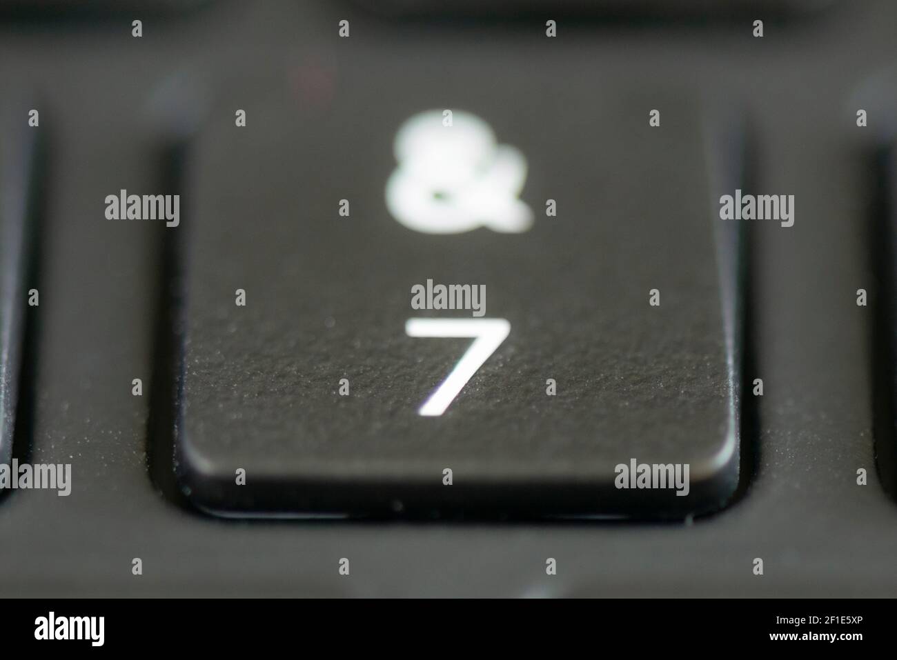 Number 7 and ampersand key on a laptop keyboard Stock Photo - Alamy