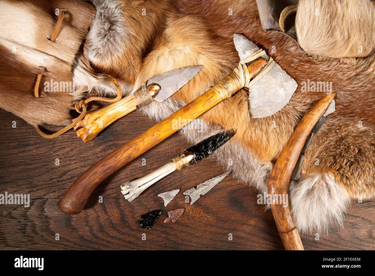 Stone Age Tools on wooden Background Stock Photo - Alamy