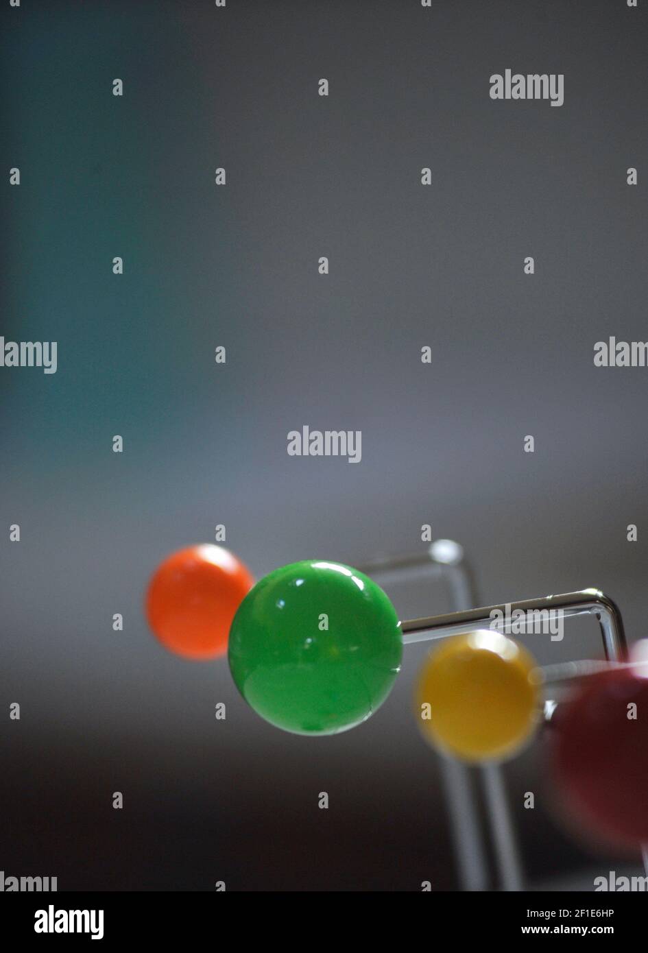 plastic ball on hat stand Stock Photo - Alamy