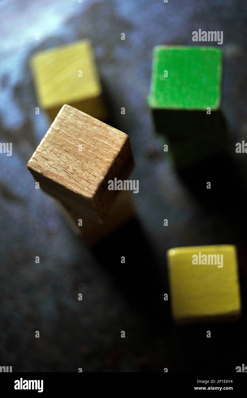 random group of coloured wooden childs play blocks Stock Photo - Alamy