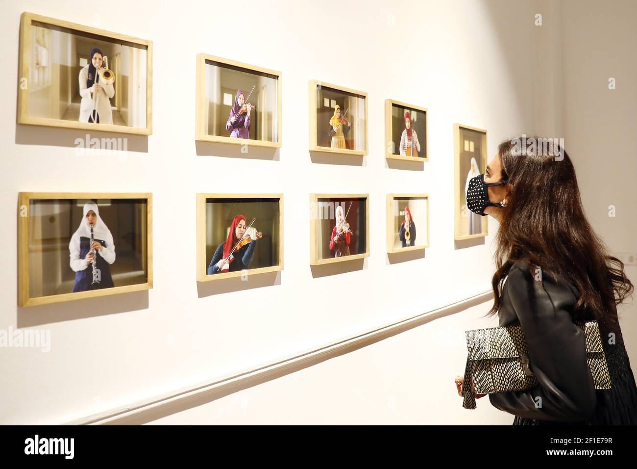 Cairo, Egypt. 6th Mar, 2021. A woman visits an exhibition entitled "Mu ...