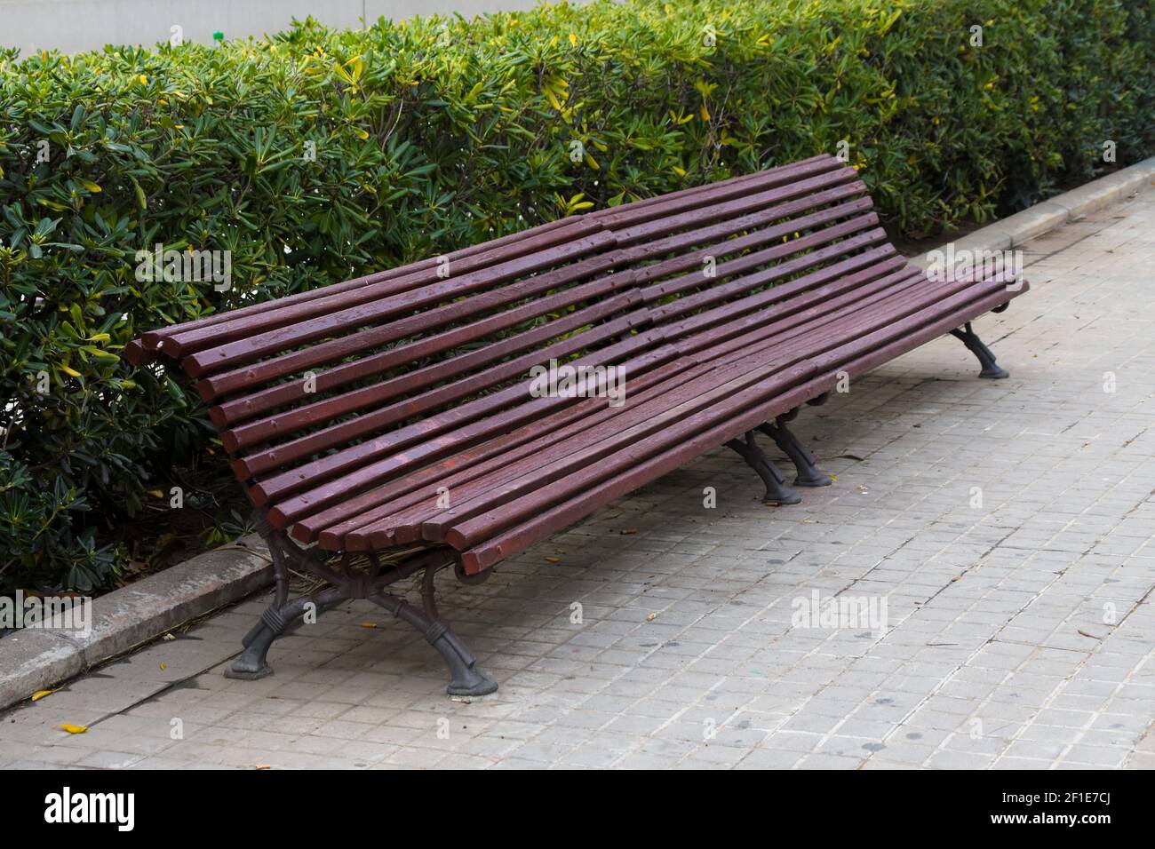 Wooden public bench outdoor. Public bench in a street Stock Photo - Alamy