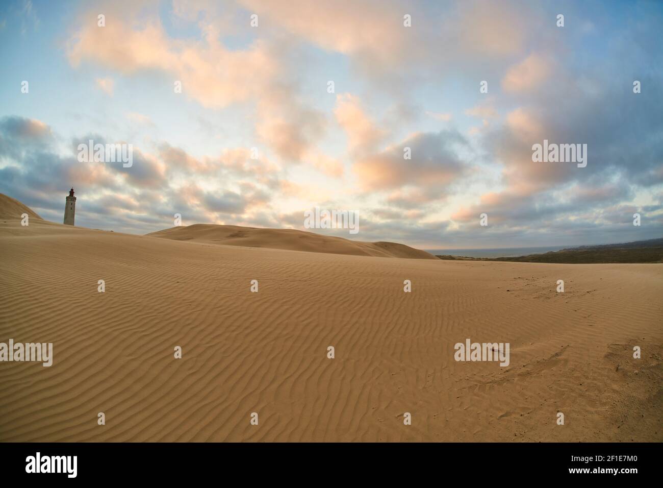Lighthouse on beach with lots of sand Stock Photo - Alamy