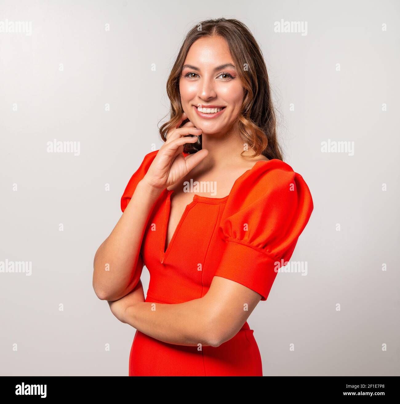 Fashion studio portrait of a beautiful woman, grey background Stock ...