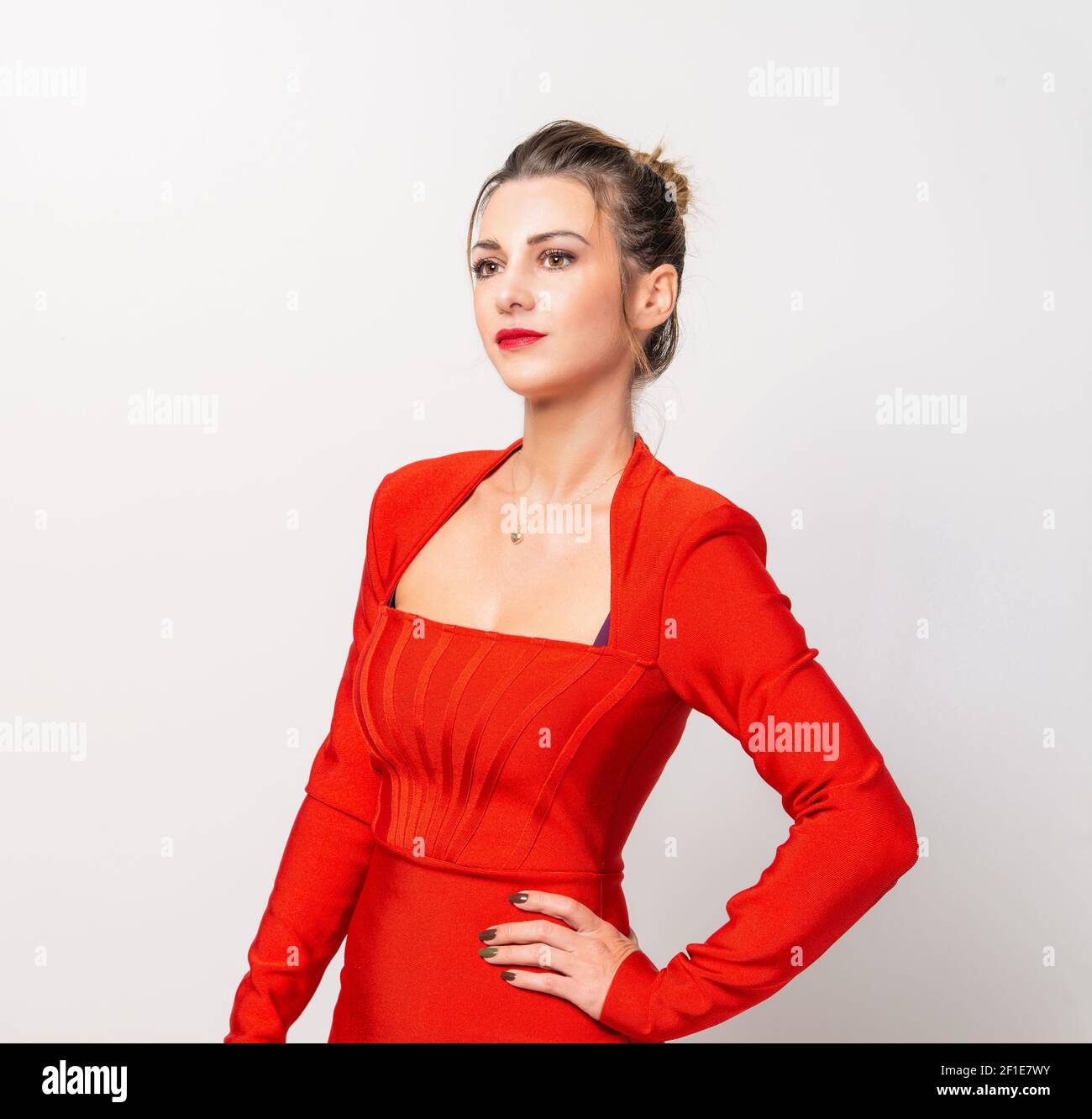 Fashion studio portrait of a beautiful woman, grey background Stock ...