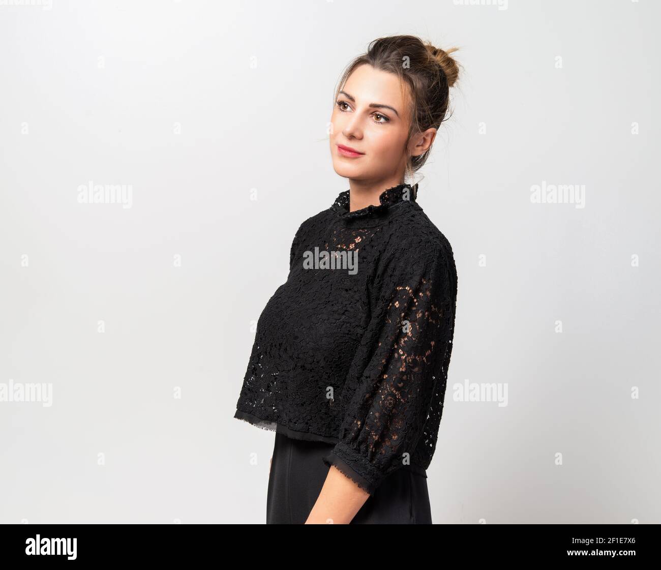 Fashion studio portrait of a beautiful woman, grey background Stock ...